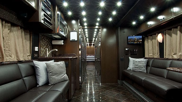 Village Coach | Tour Bus Rental | Entertainer Coach Leasing