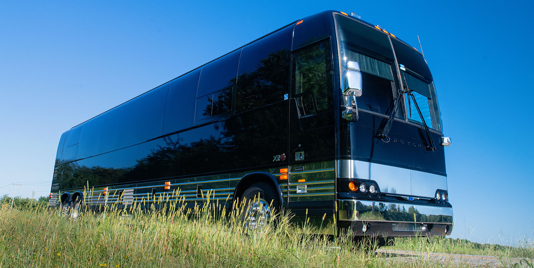 Village Coach | Tour Bus Rental | Entertainer Coach Leasing
