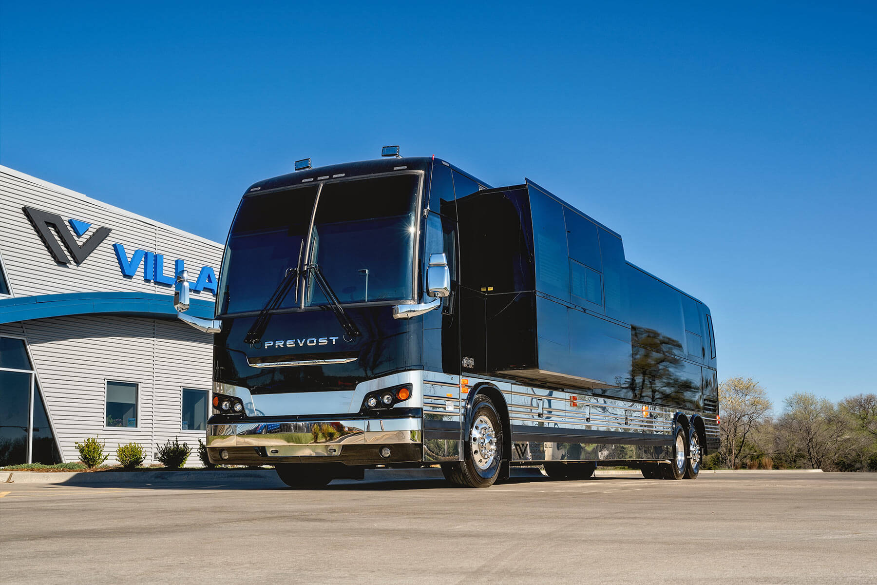 Raven Entertainer Coach | 12 Bunk Single Slide Elite Tour Bus